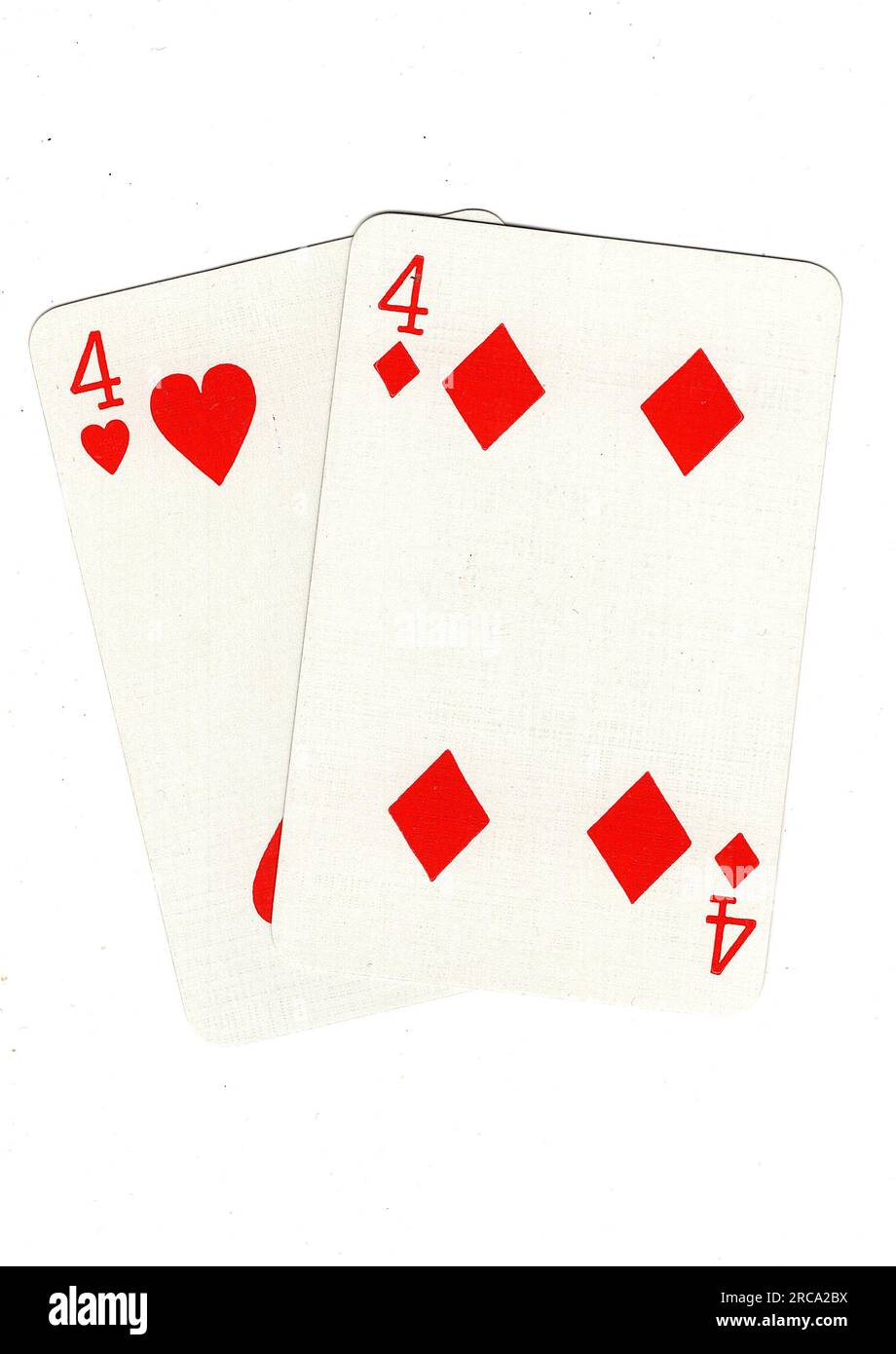 Vintage playing cards showing a pair of red fours on a white background ...