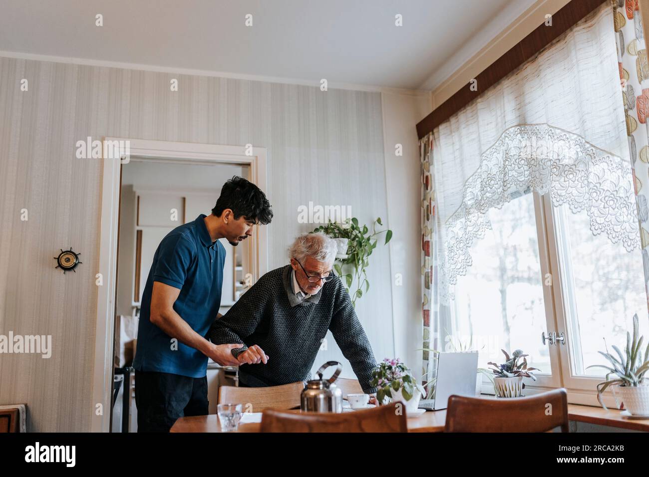 Helping hand to walk hi-res stock photography and images - Alamy