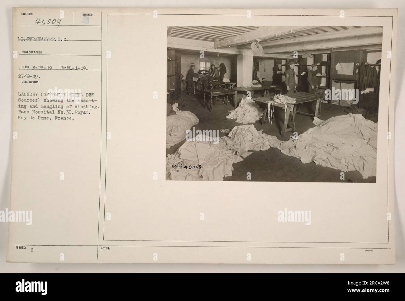 The image captures a scene at the laundry facility opposite Hotel Des ...