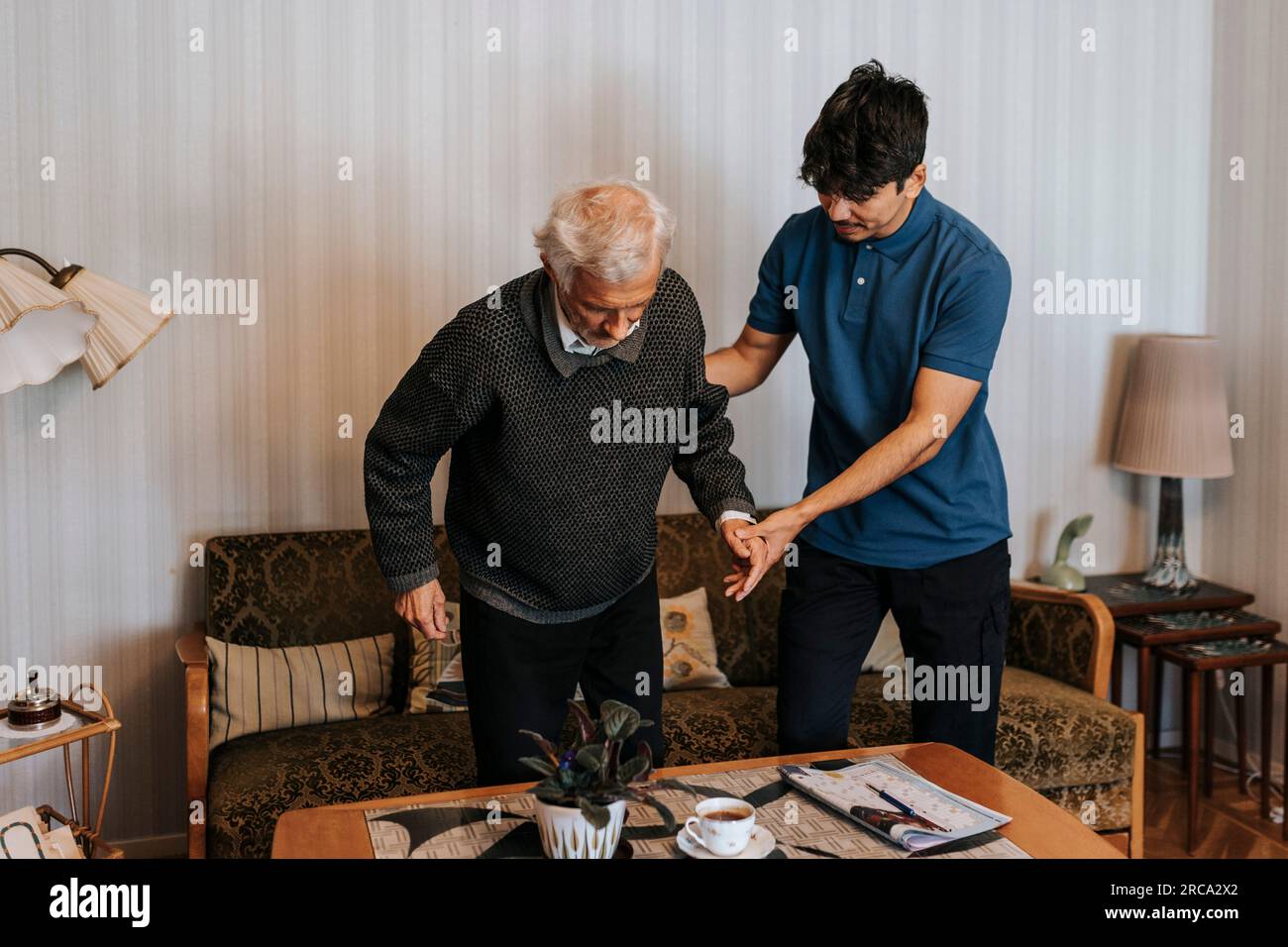 Senior asian man home sofa hi-res stock photography and images - Alamy