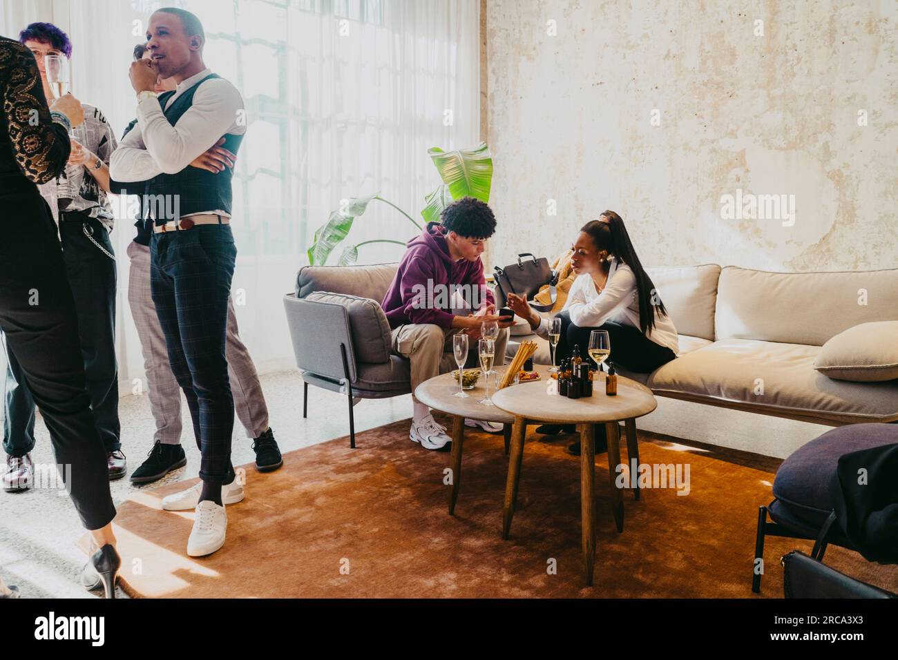 Business colleagues interacting during event at convention center Stock ...