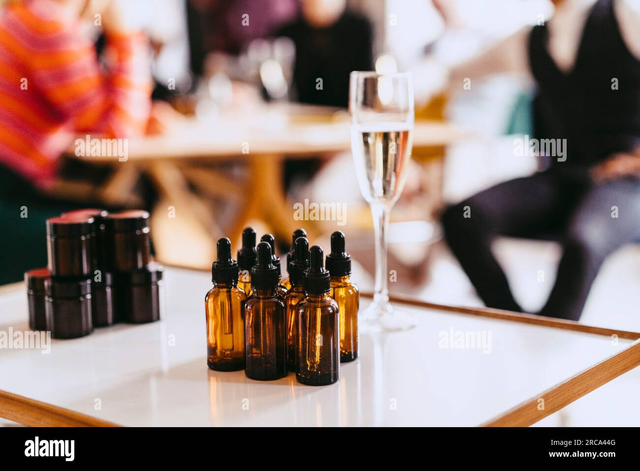 Bottles of essential oils samples arranged on table during event at ...