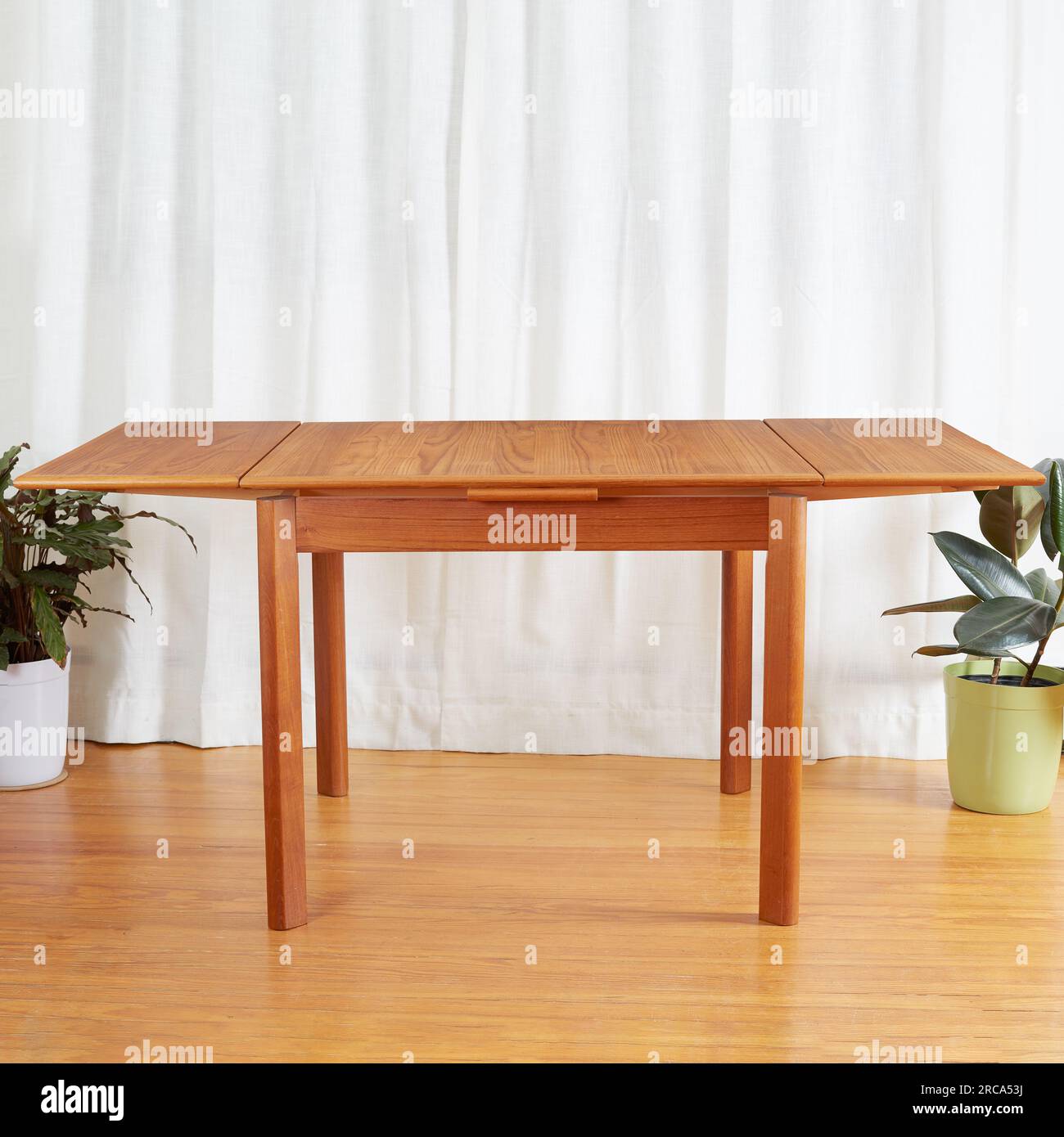 Vintage draw-leaf dining room table. Mid-century modern teak furniture ...