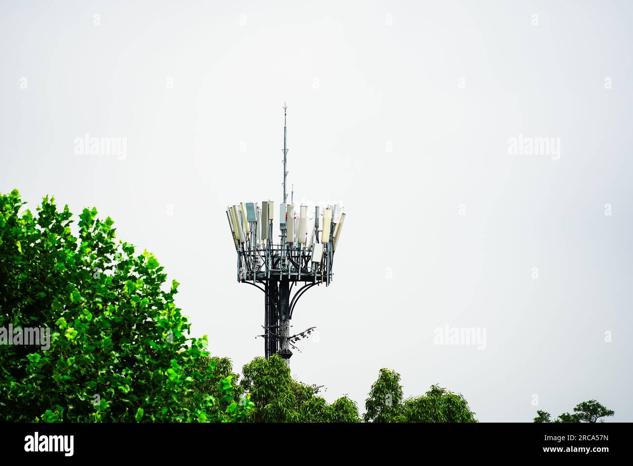 Mobile phone wireless phone repeater tower with multiple antennas installed in a crown shape ...