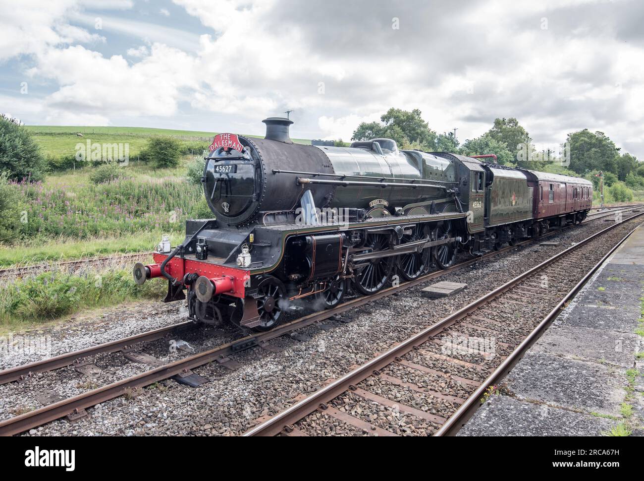 LMS 45627 awaits disconnection of diesel train on the other side of the ...