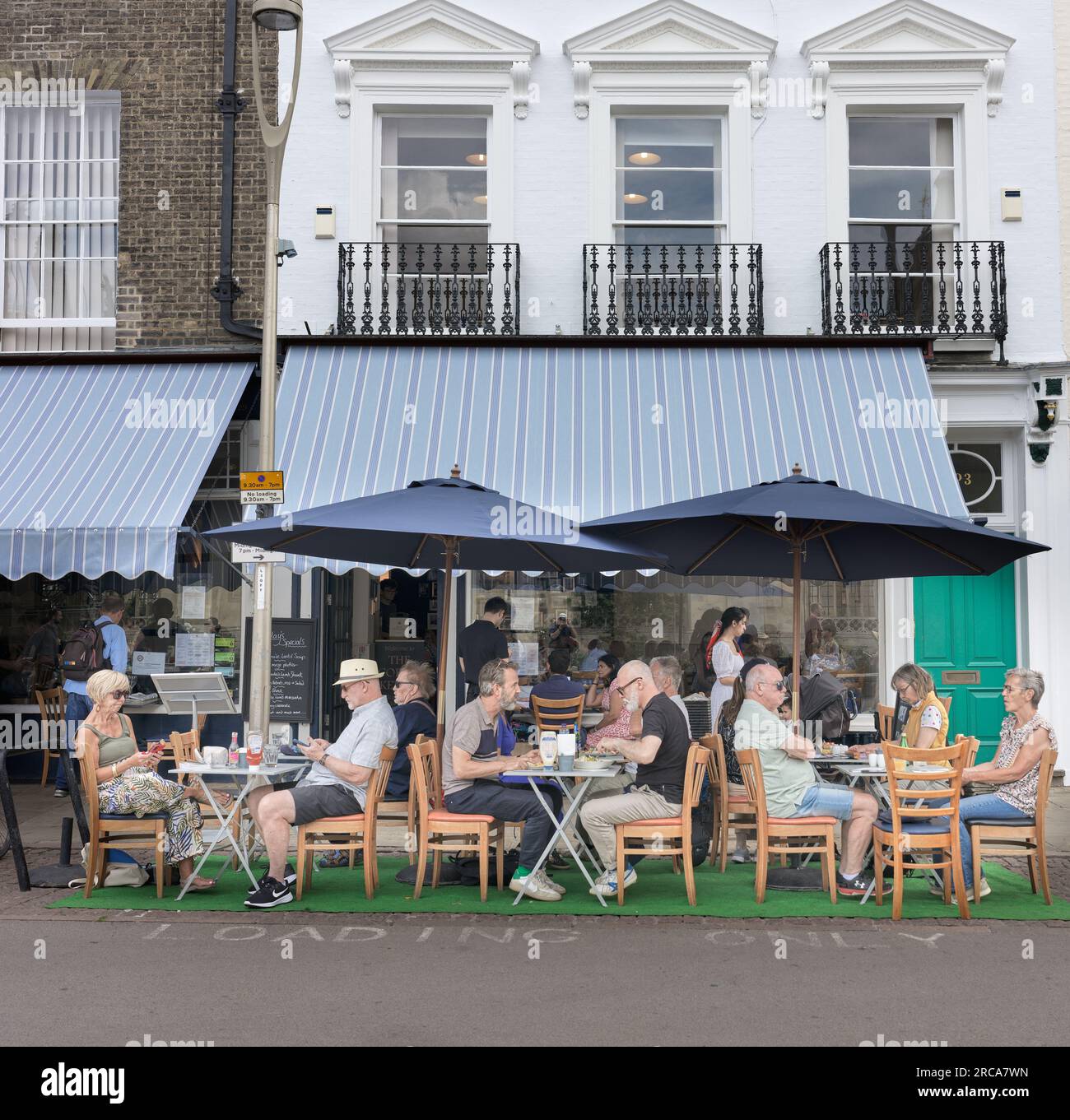 Outdoors eating at a café opposite King's College, Cambridge, England ...