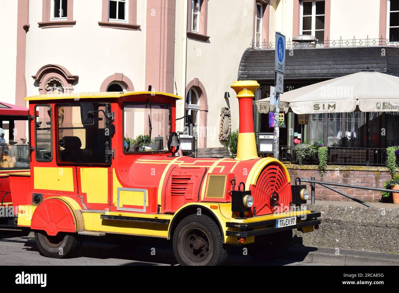 Touristic City Tour vehicles in Trier Stock Photo - Alamy