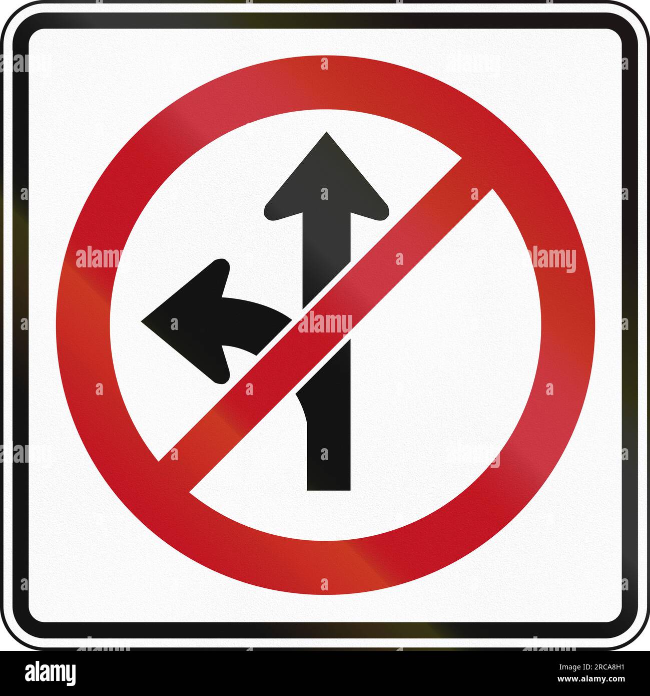 Canada traffic sign - No straight through or left turn. This sign is ...