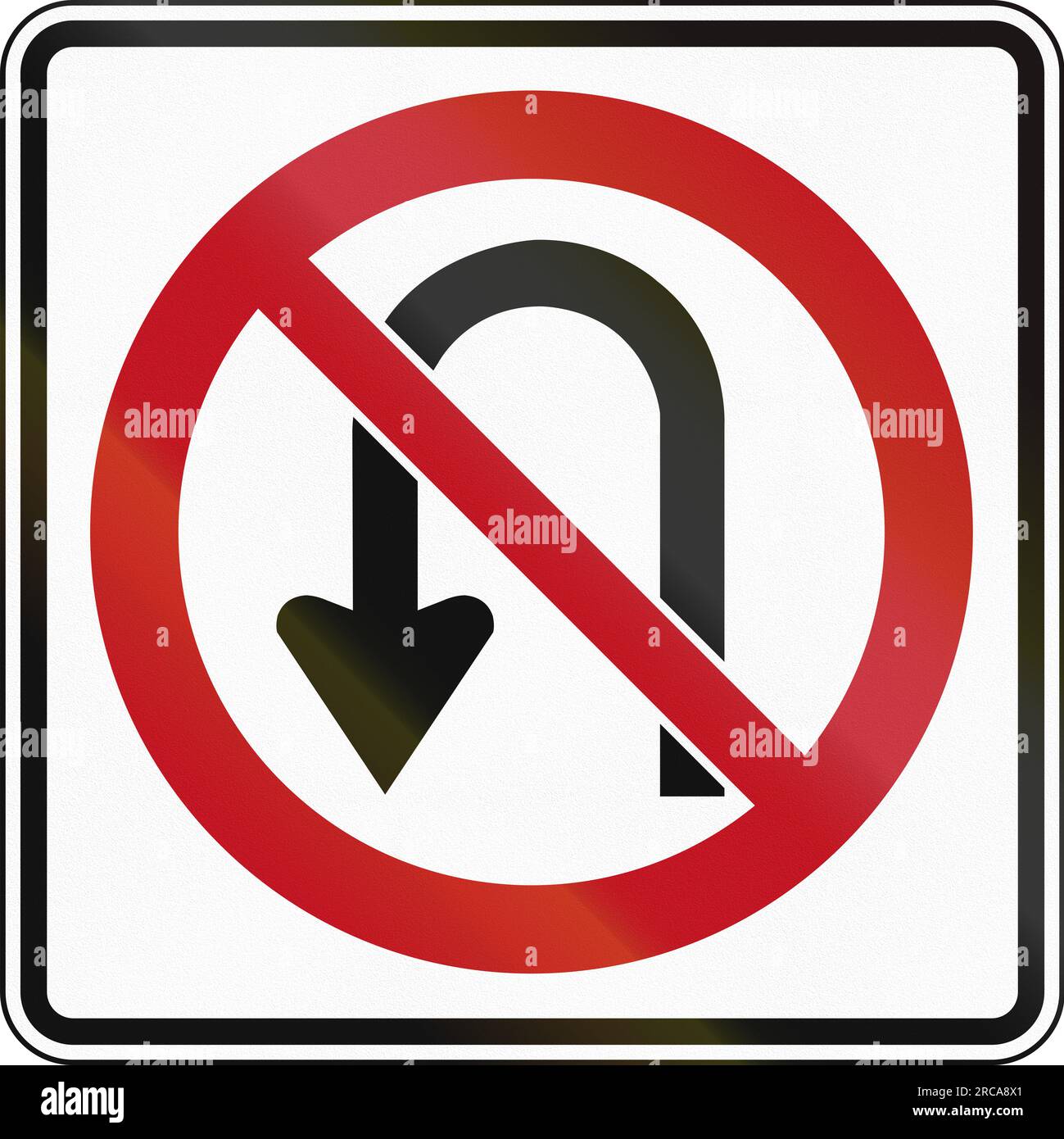 An Canadian regulatory sign - no U-turn. This sign is used in Ontario ...