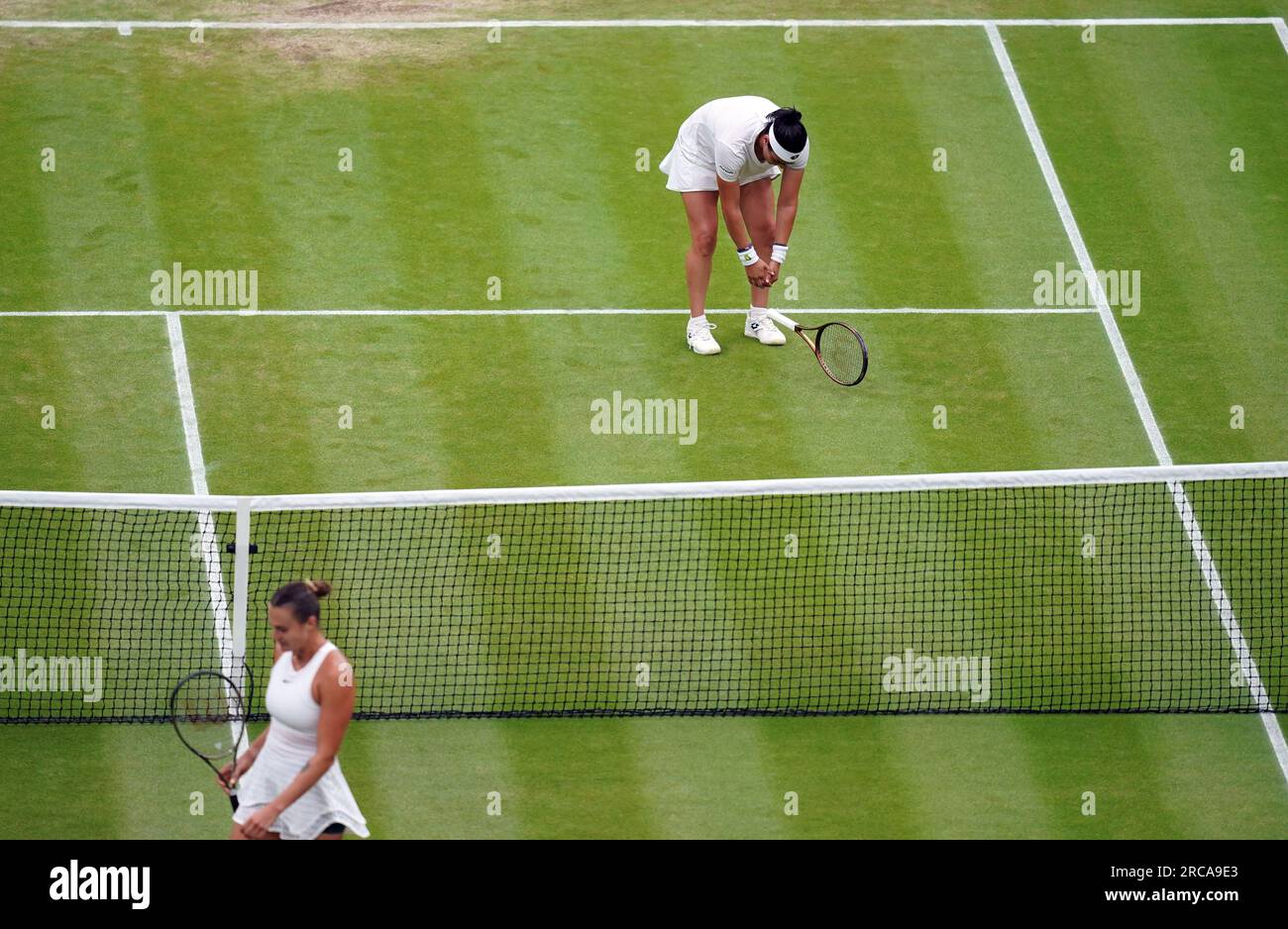 Ons Jabeur reacts during the Ladies Singles - Semi Final match against ...