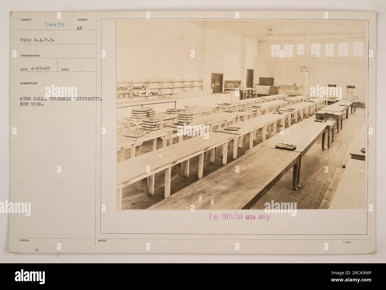 Soldiers from the Students' Army Training Corps (SATC) eat in the mess ...