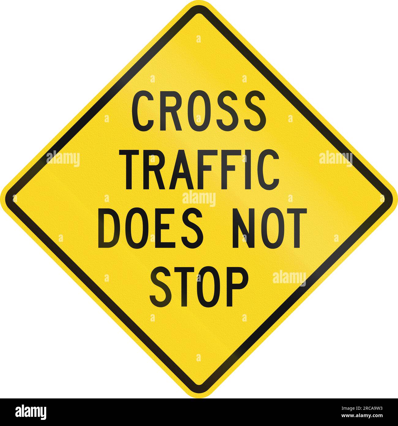 Warning road sign in Canada - Cross traffic does not stop. This sign is ...