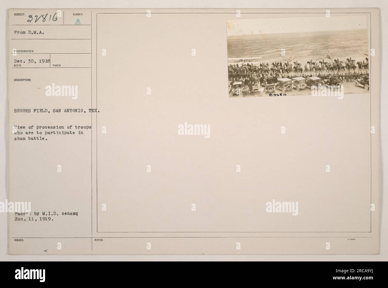 Troops participating in a procession for a sham battle at Brooks Field ...