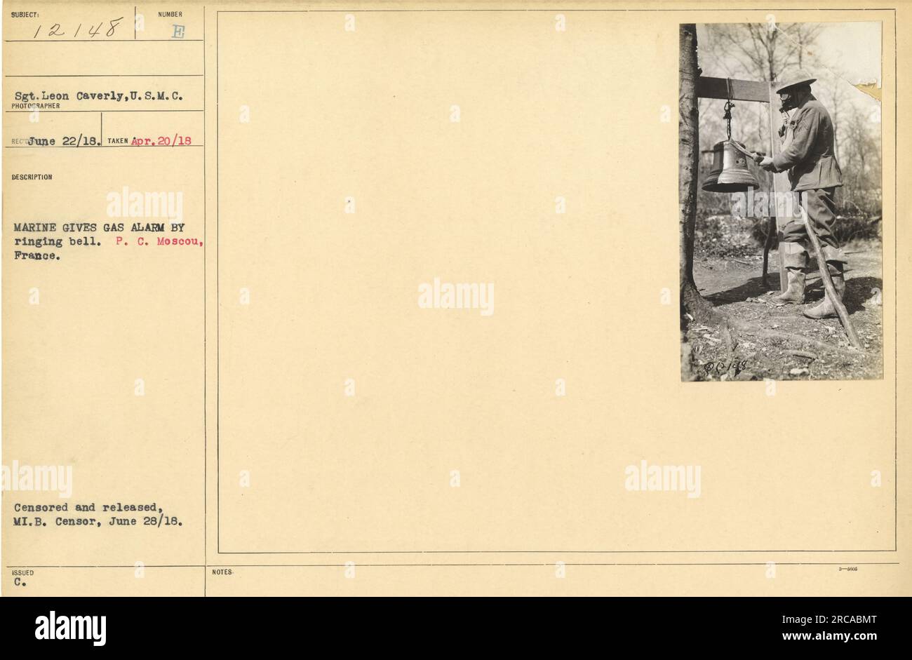 Sgt. Leon Caverly, a U.S. Marine Corps member, gives a gas alarm by ...