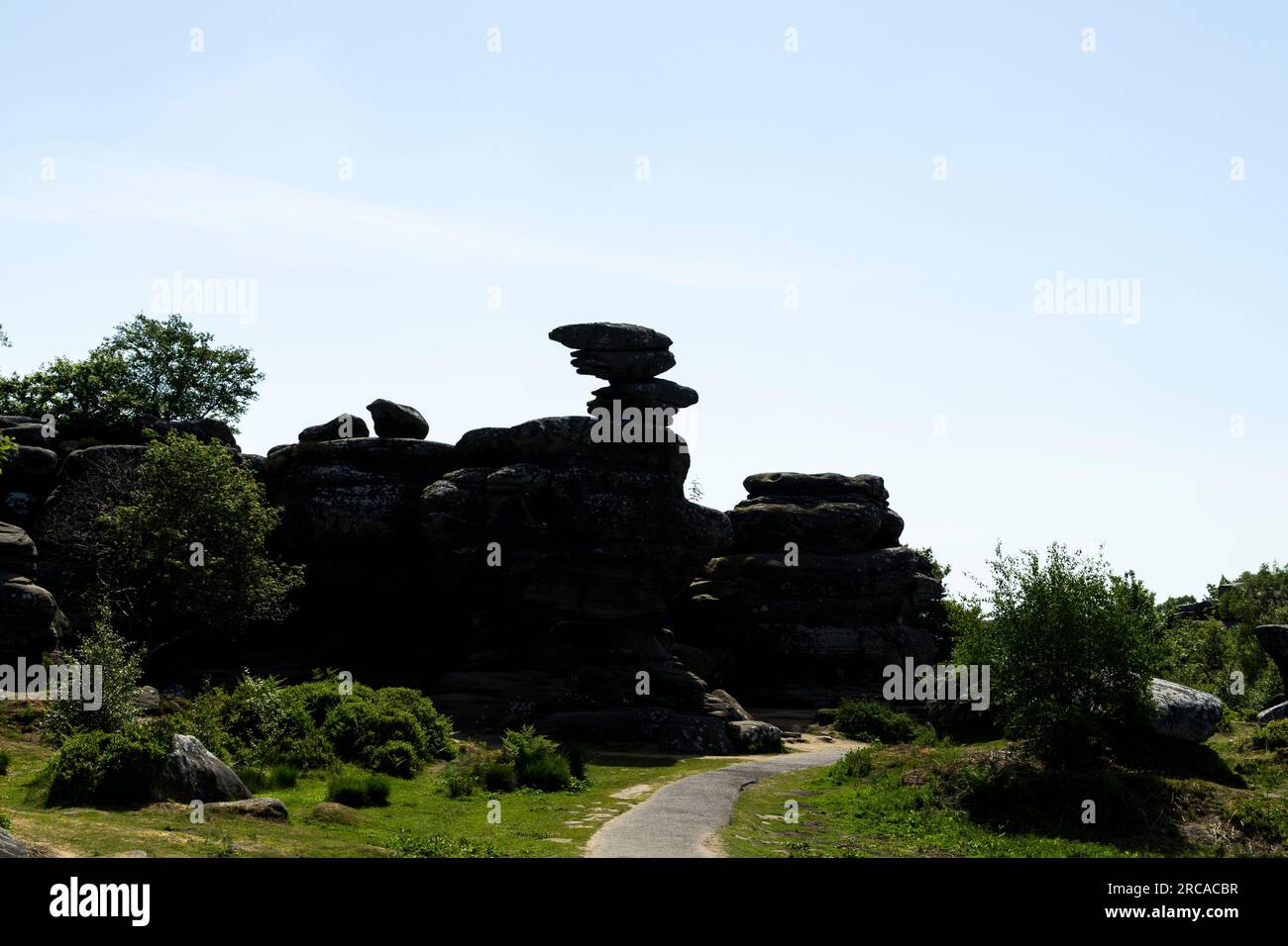 Silhouette balancing rocks, Brimham Rocks, Harrogate, North Yorkshire ...