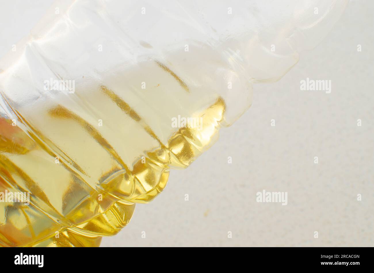Cooking oil bottle in focus, providing practicality and flavor to your ...