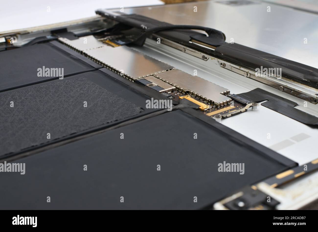 Exploring the inside of a modern tablet, highlighting advanced repair ...