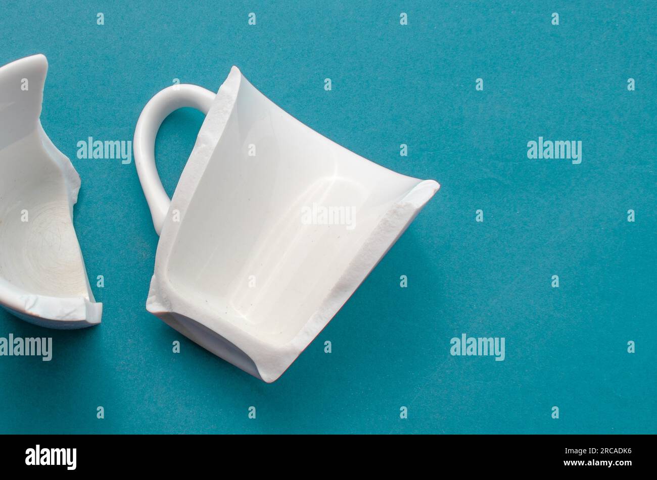 Fragments of a shattered cup, revealing beauty in imperfection Stock ...