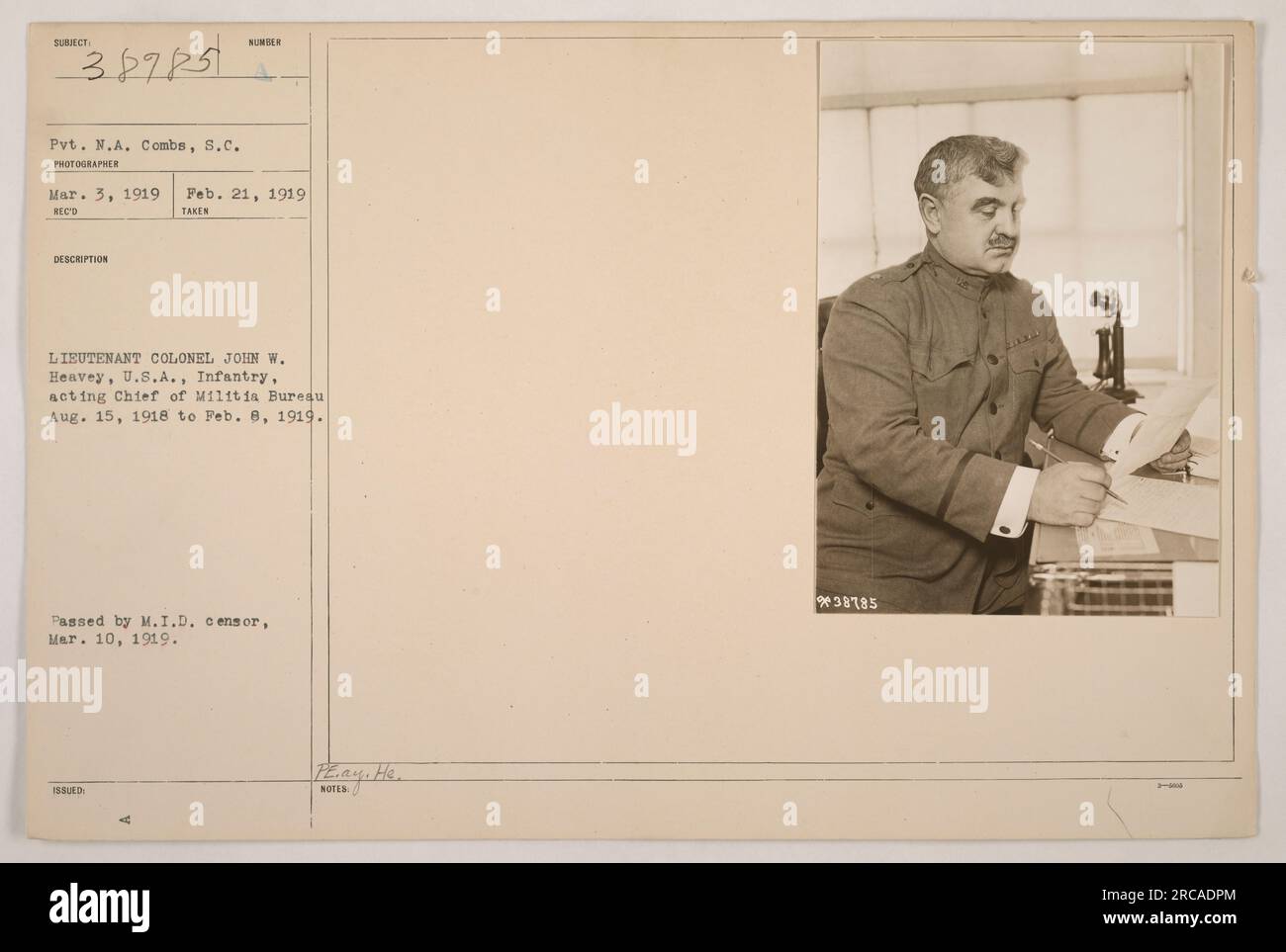 Caption: Pvt. N.A. Combs S.C. with Lieutenant Colonel John W. Heavey, U ...