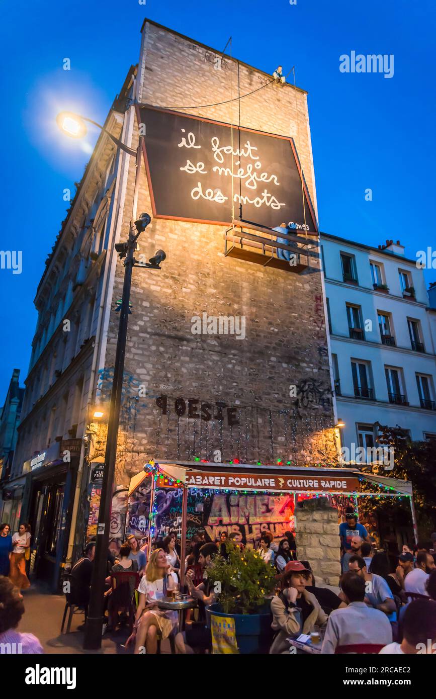 Busy outdoor bar at the Cabaret Populaire Culture Rapide and Il faut se ...
