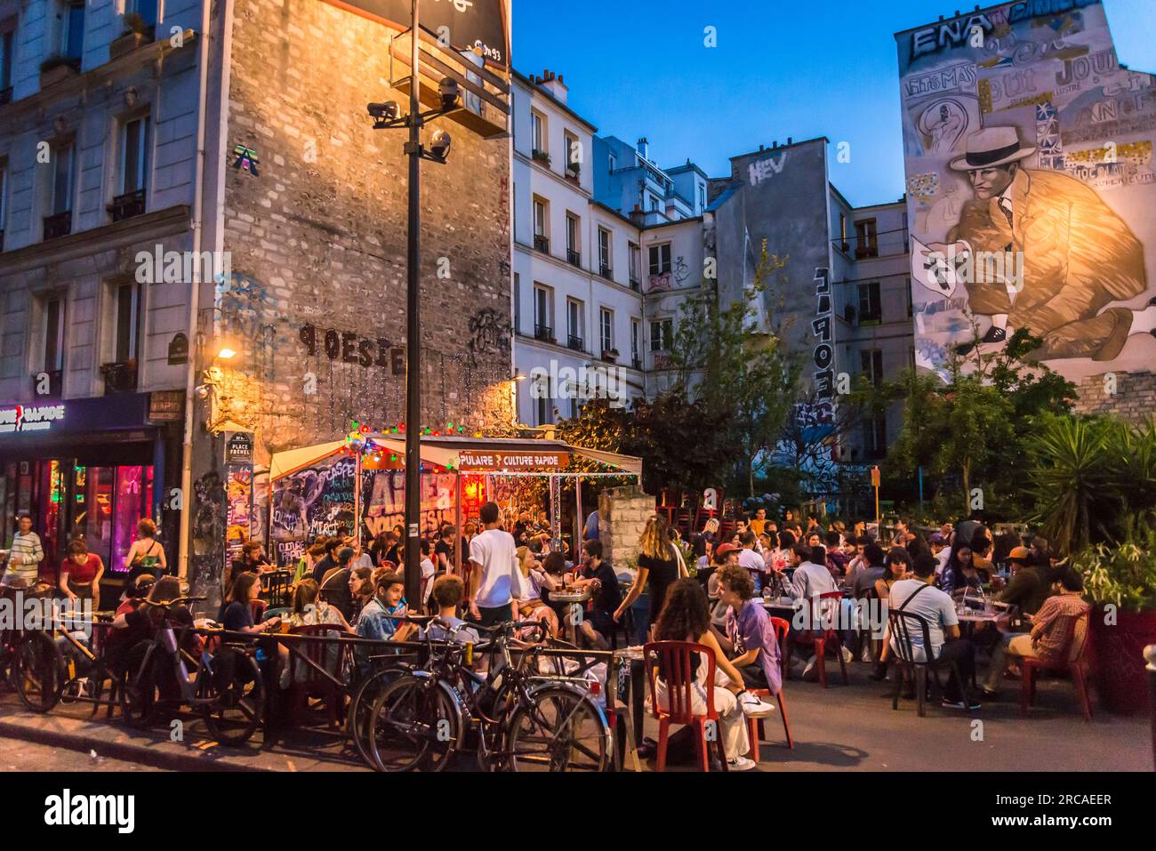 Busy outdoor bar at the Cabaret Populaire Culture Rapide, 20th ...