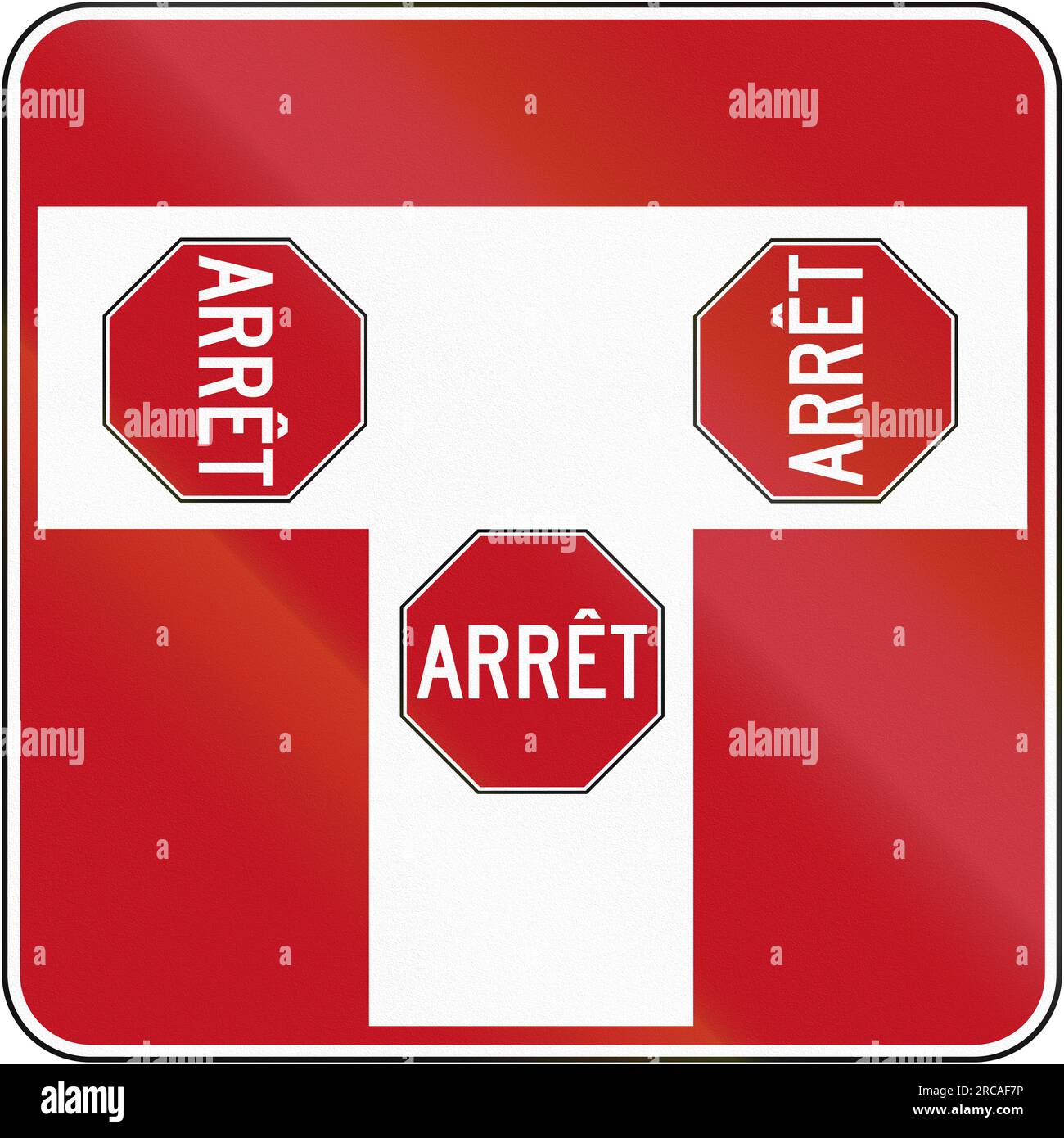 Regulatory road sign in Quebec, Canada - T intersection with stop signs ...