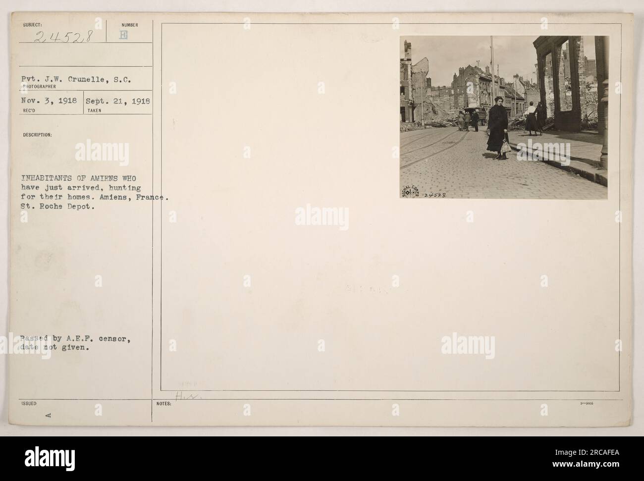 Pvt. J.W. Crunelle of the S.C. captures a photograph of newly arrived ...