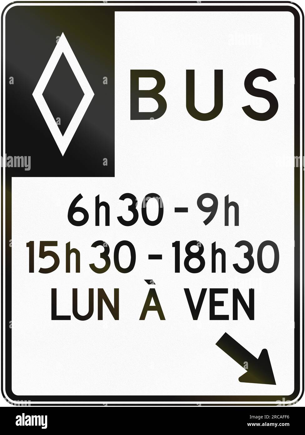 Regulatory road sign in Quebec, Canada - Bus lane on right in specified ...