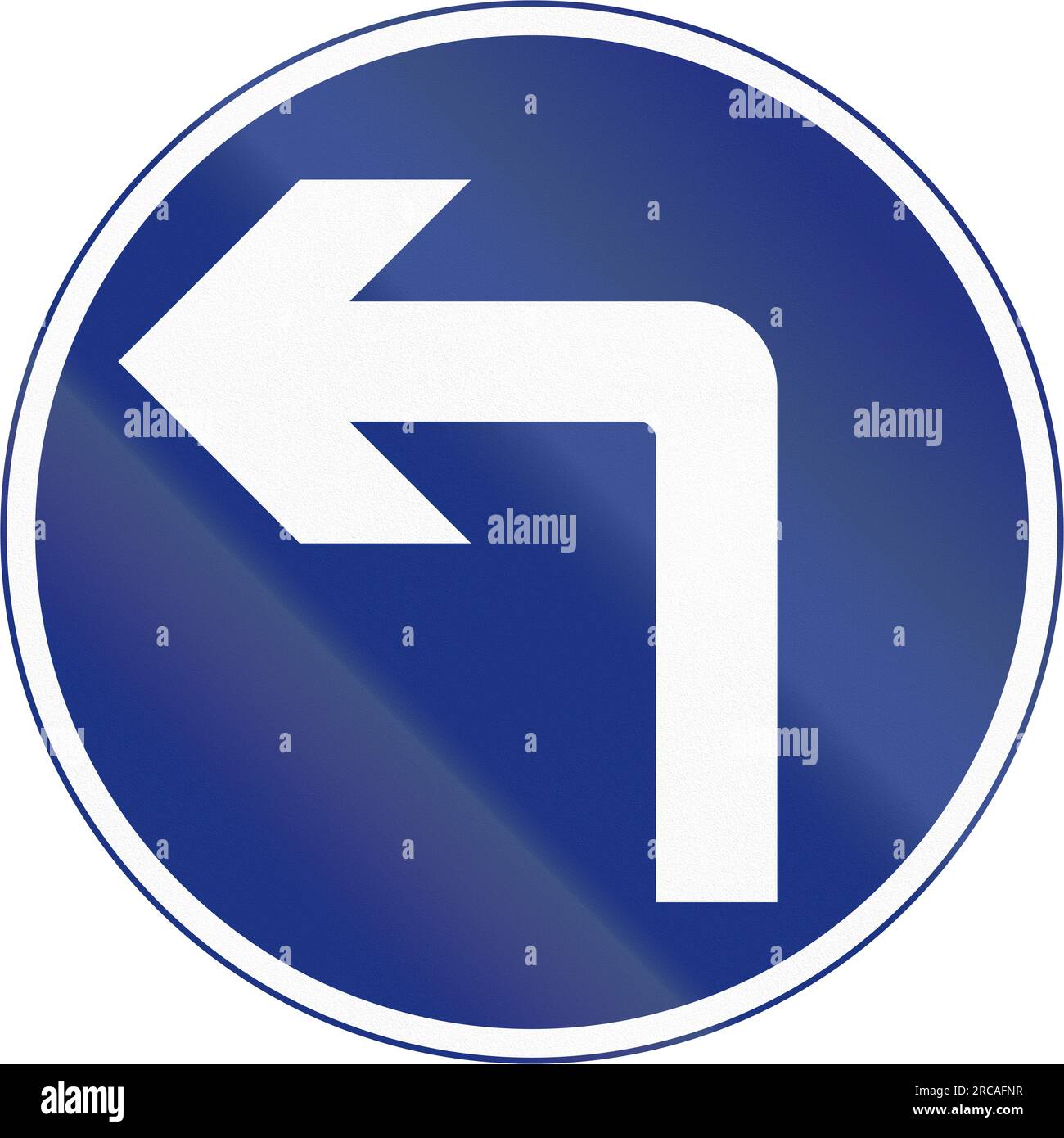 Irish traffic sign - Turn left ahead Stock Photo - Alamy
