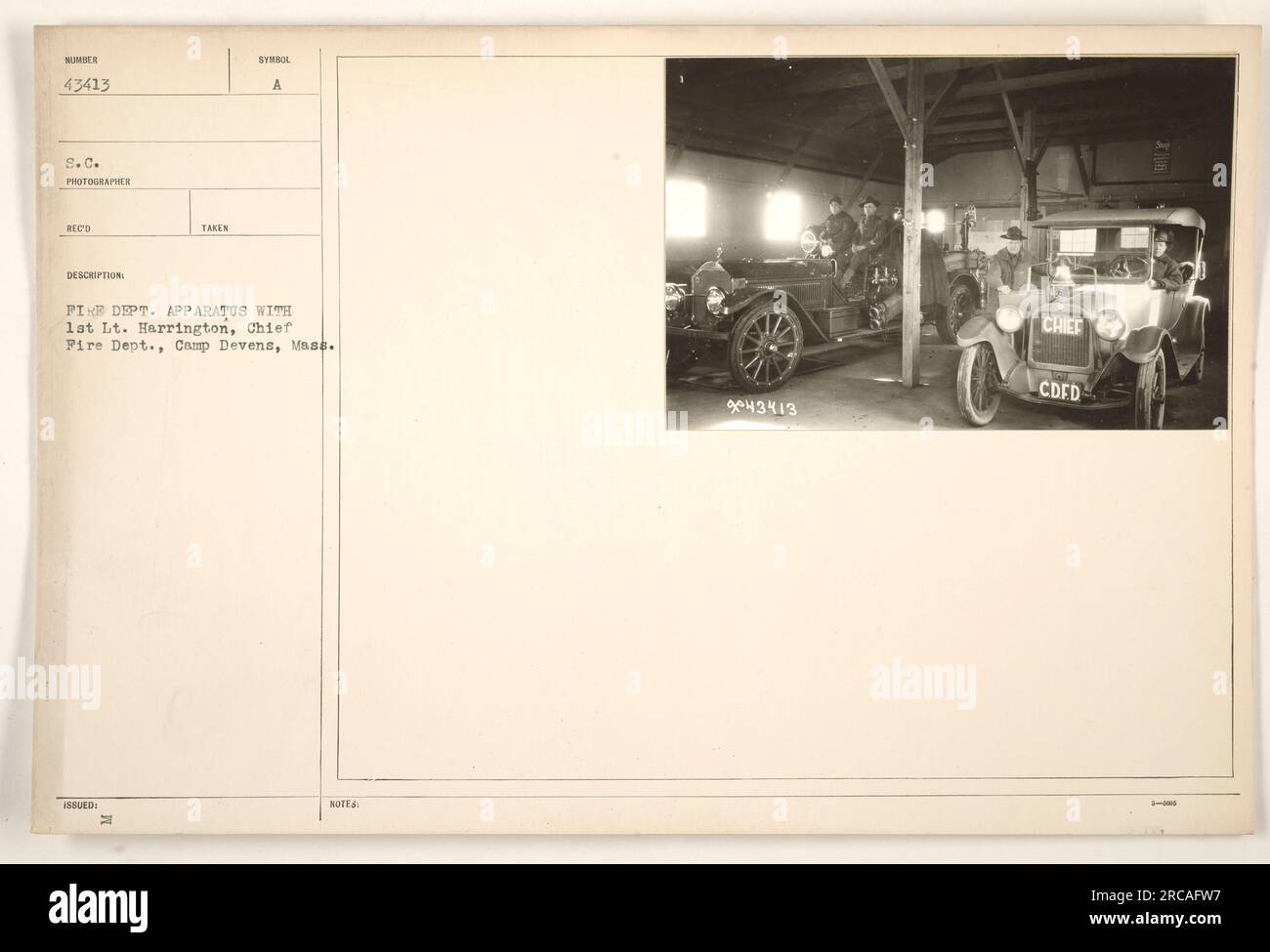 A fire department apparatus with 1st Lt. Harrington, Chief of the Fire ...