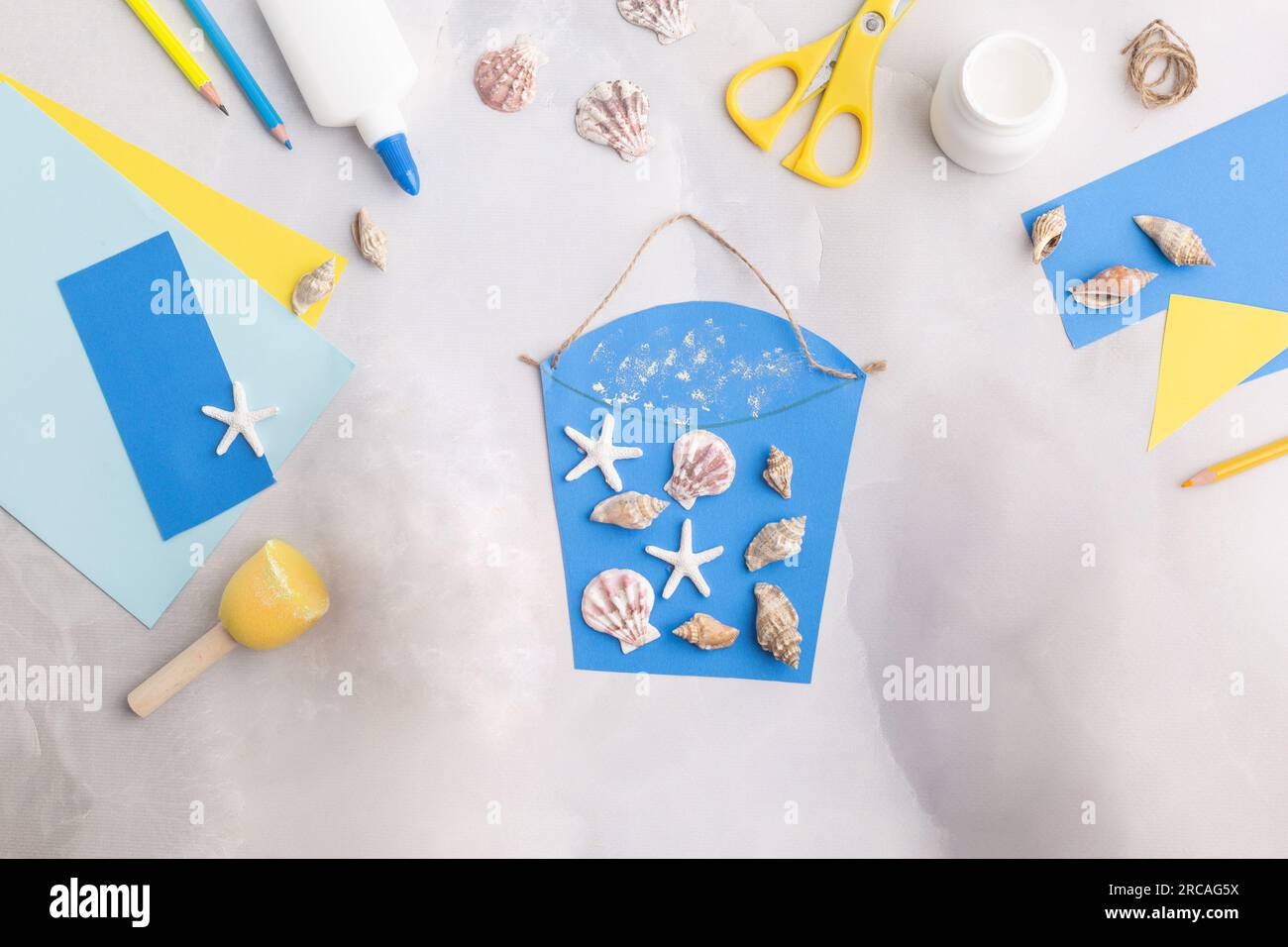 Paper bucket of shells summer idea for kids craft in kindergarten ocean ...