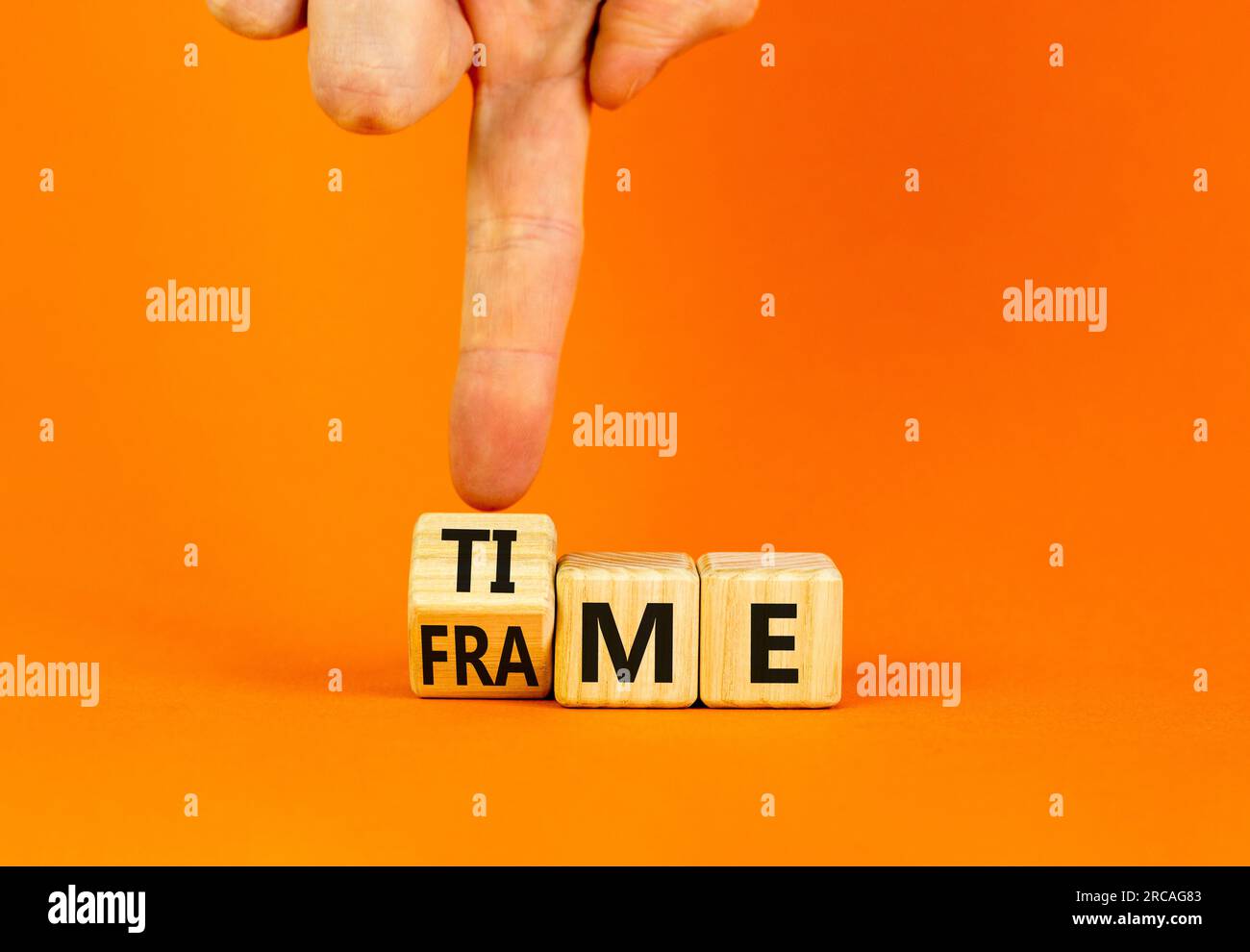 Time frame symbol. Businessman turns wooden cubes and change the ...