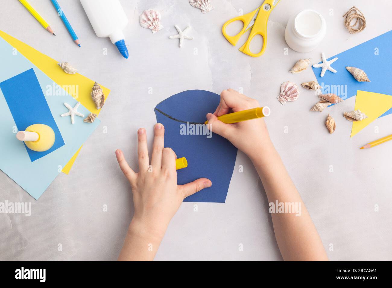 Paper bucket of shells summer idea for kids craft in kindergarten hands ...