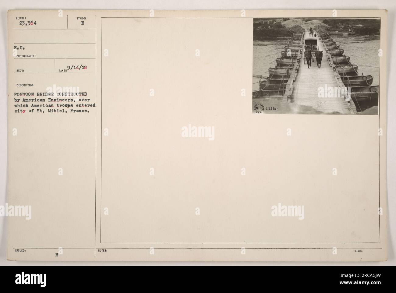 American engineers constructing a pontoon bridge in St. Mihiel, France ...