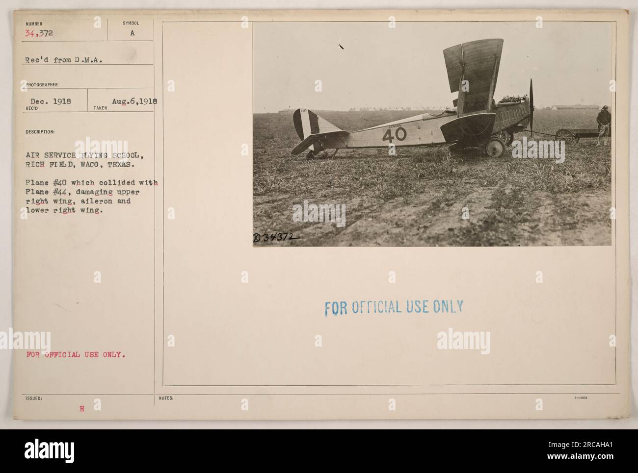 Image 111-SC-34372 shows the aftermath of a collision between Plane #40 ...