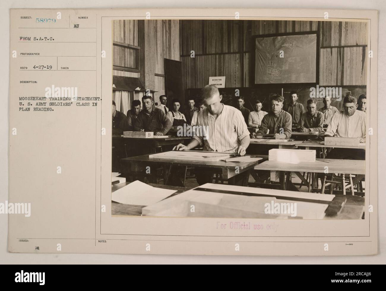 U.S. Army soldiers attending a class on plan reading at Mooseheart ...