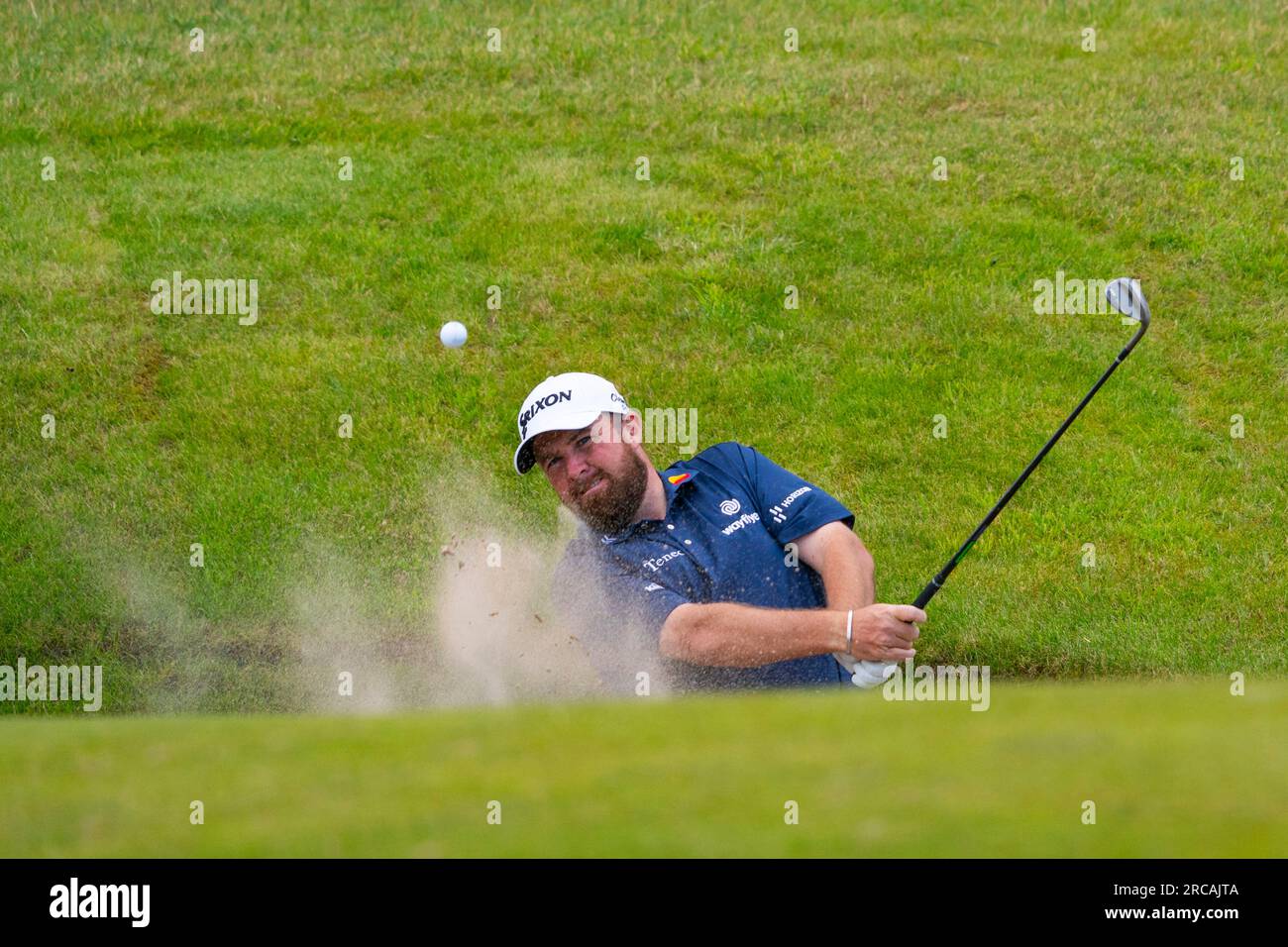 North Berwick, East Lothian, Scotland, UK. 13th July 2023. Shane Lowry plays out of green side ...