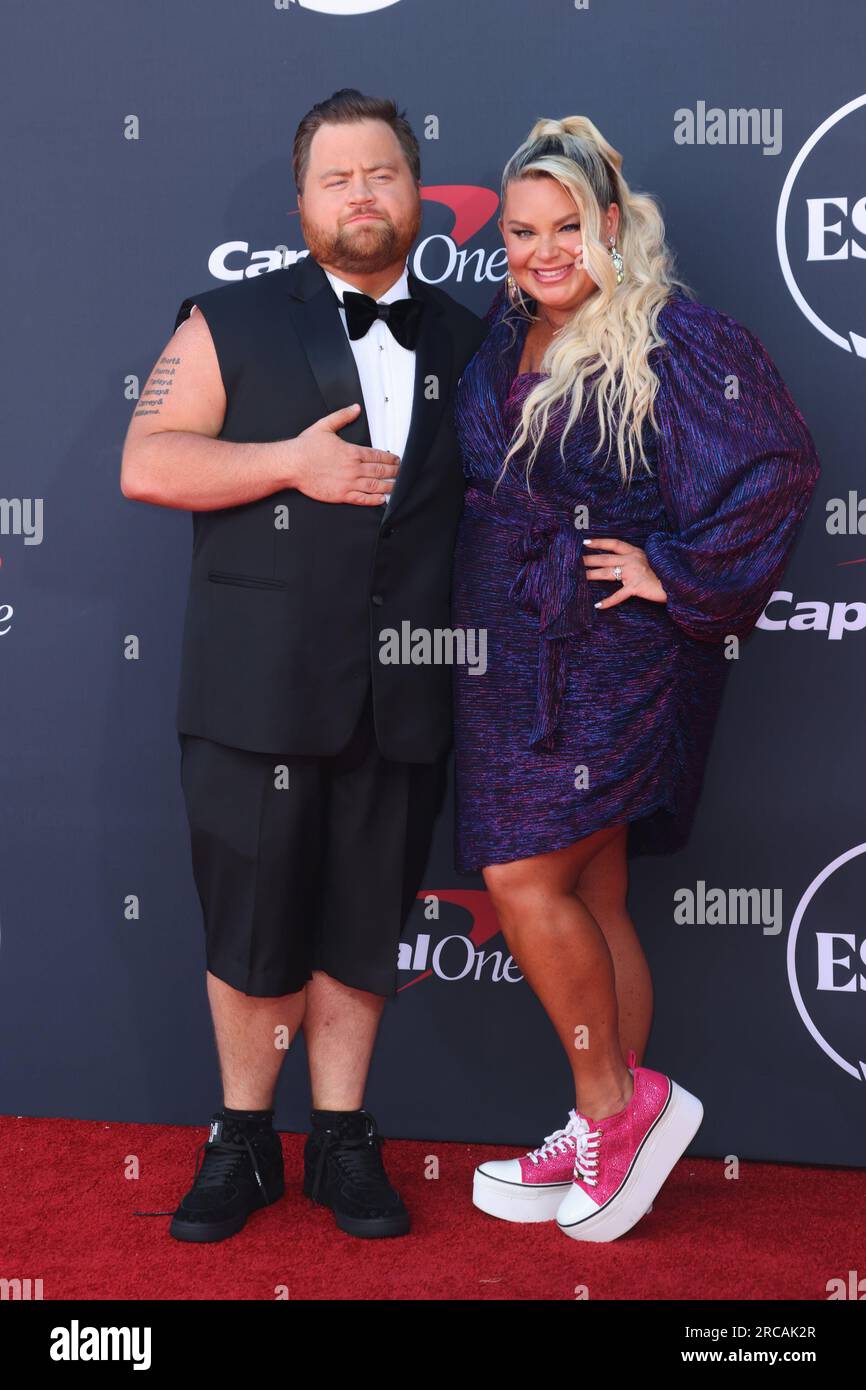 Hollywood, CA, July 12, 2023. Paul Walter Hauser and Amy Boland Hauser ...