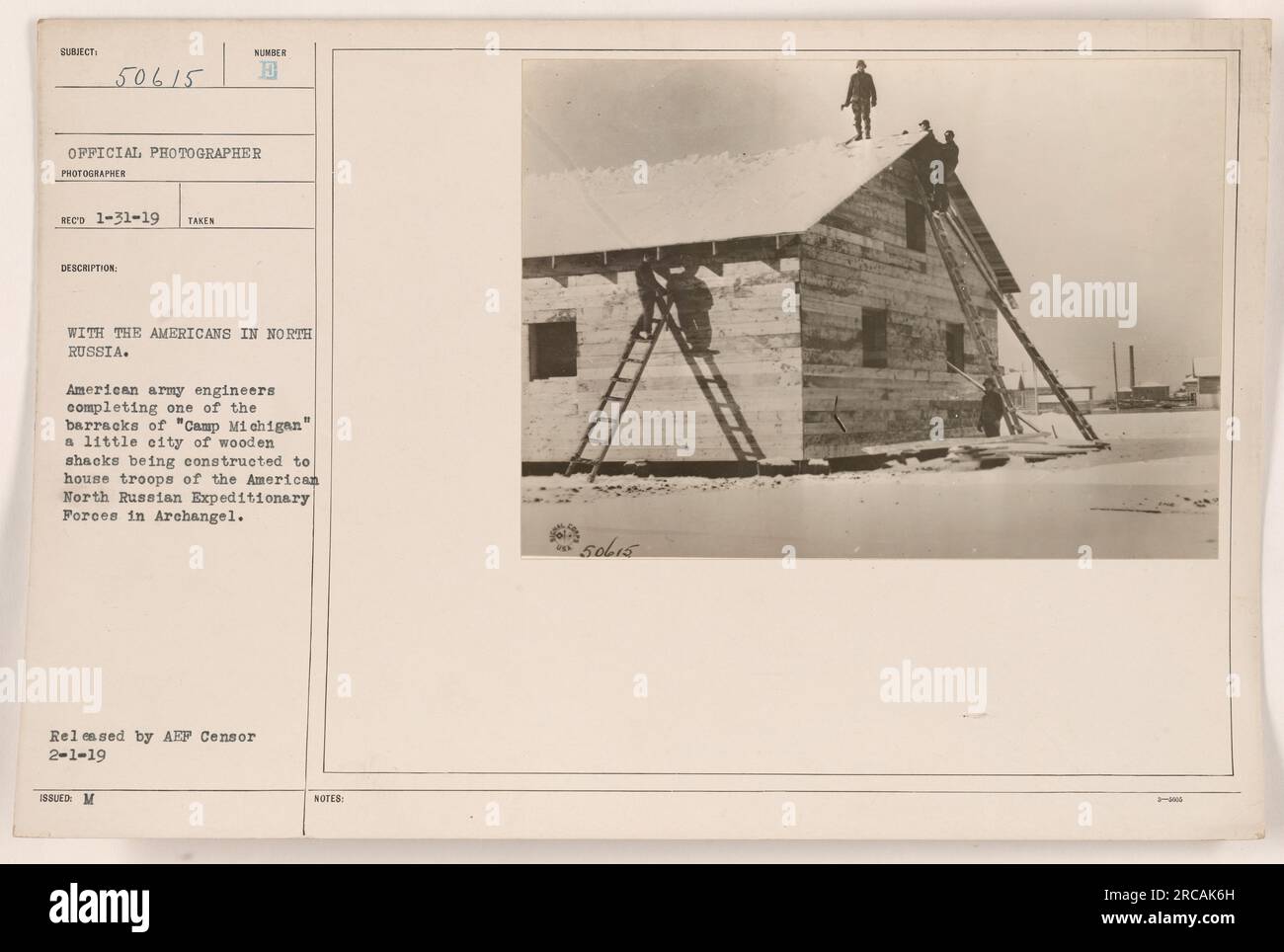 American army engineers are seen completing one of the barracks at ...
