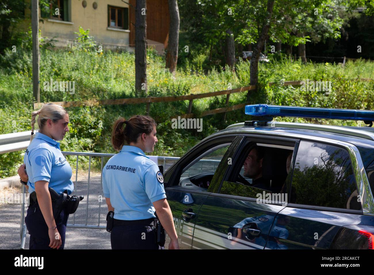 Vernet, France. 13th July, 2023. Two gendarmes let a gendarmerie car ...