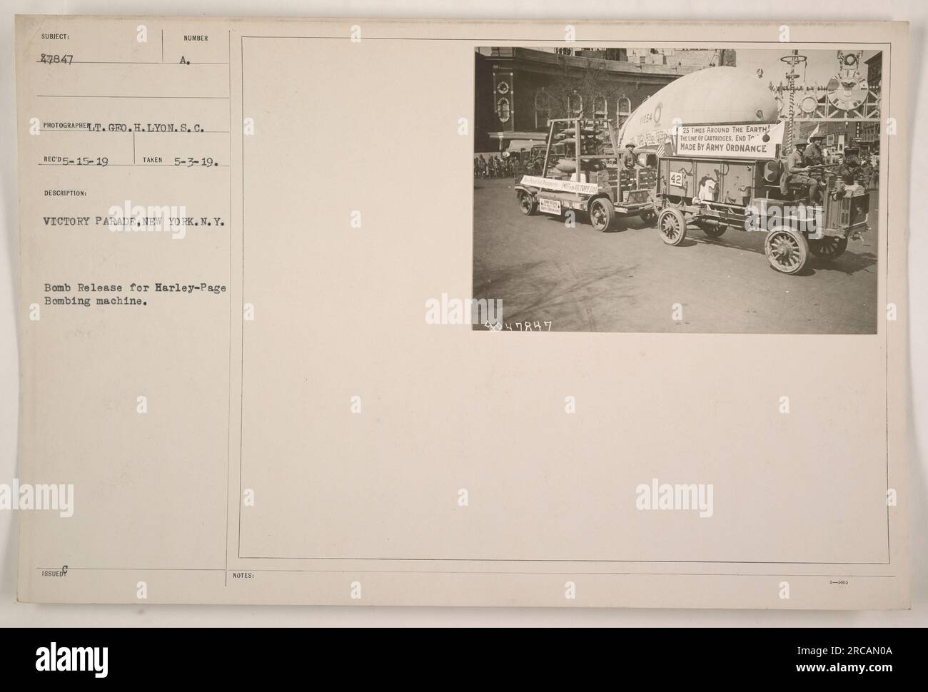 Caption: A photograph taken during the Victory Parade in New York ...