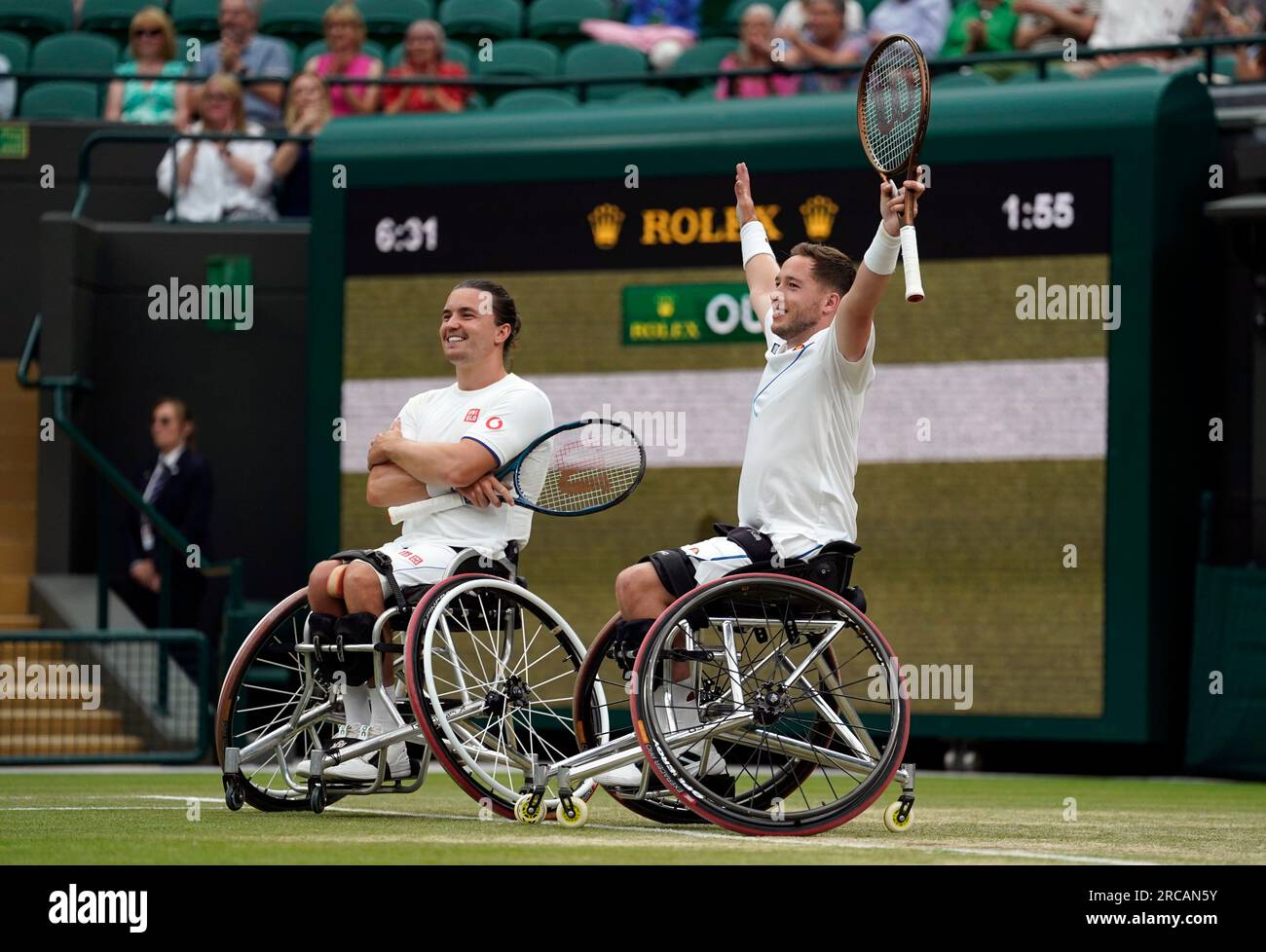 Gordon Reid (left) and Alfie Hewett celebrate victory following their ...