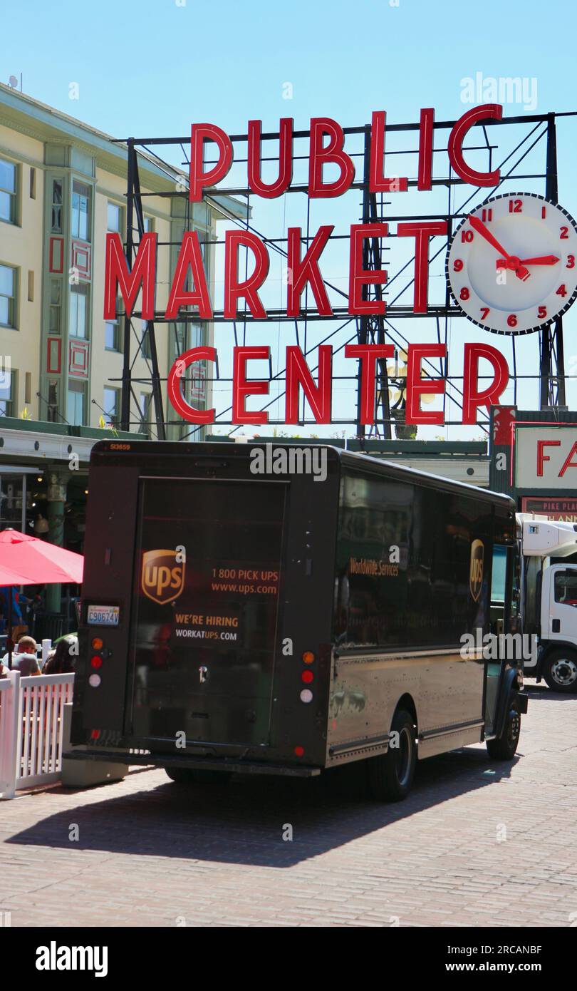 Sign Public Market Centre and clock at Pike Place Market with a UPS ...