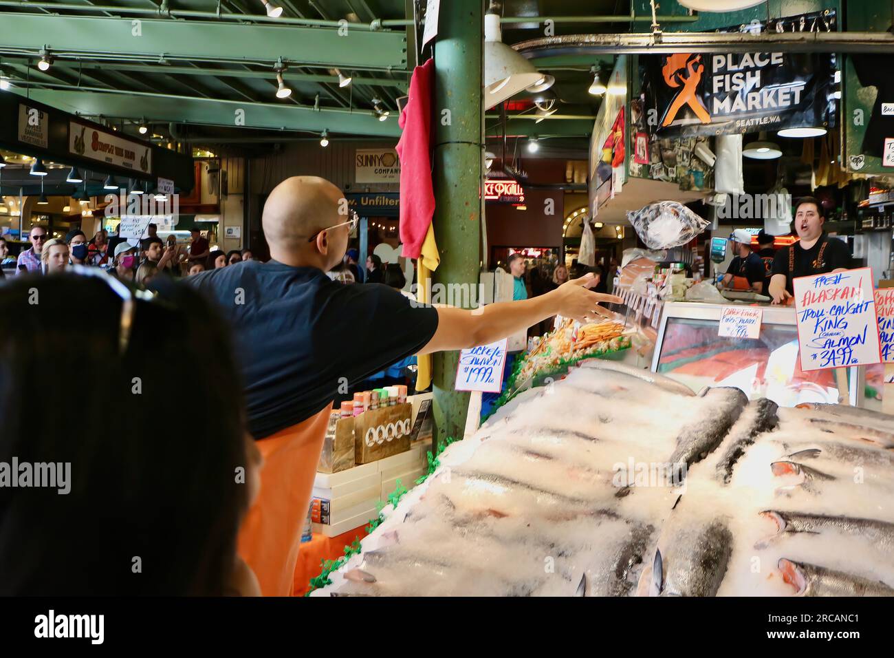 Famous for fish throwing the purchases of customers before wrapping ...