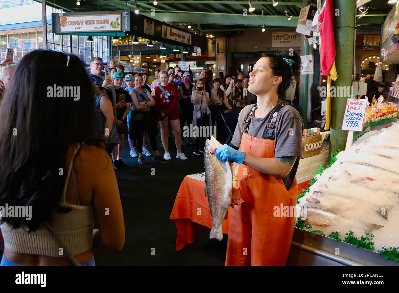 Famous for fish throwing the purchases of customers before wrapping ...