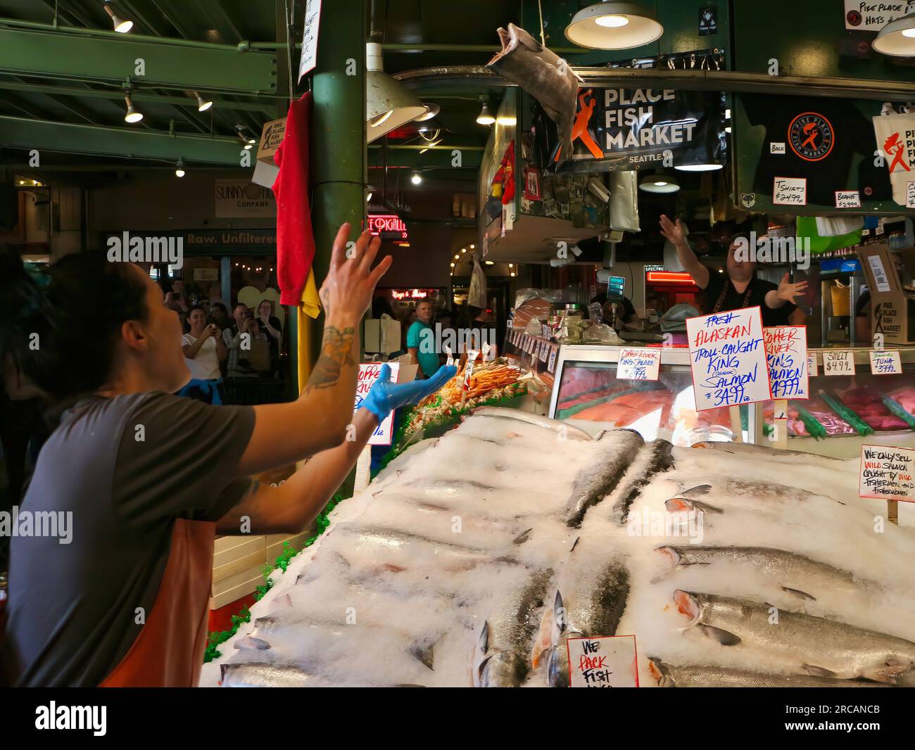 Famous for fish throwing the purchases of customers before wrapping ...