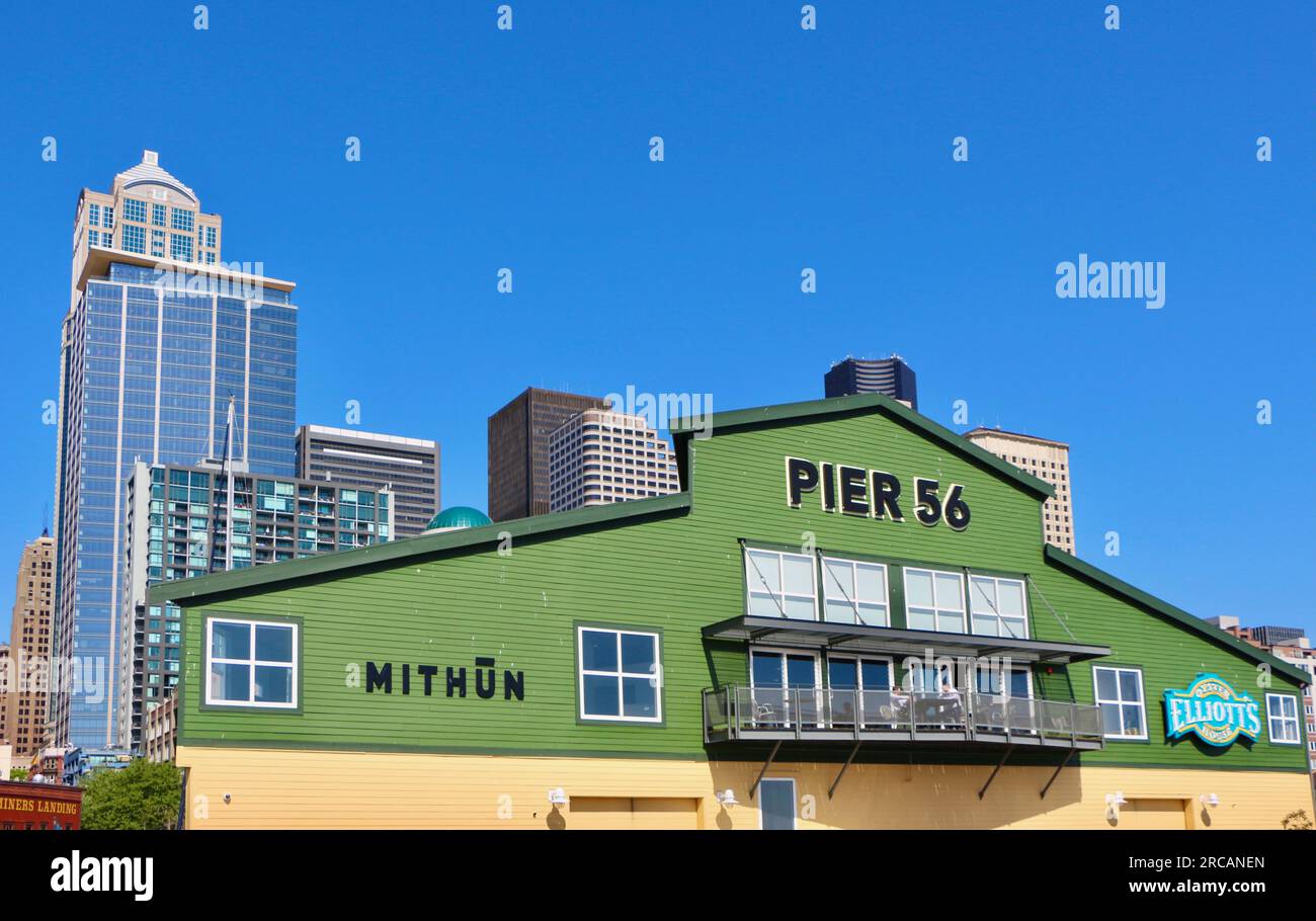 Pier 56 building with skyscrapers behind from the waterfront in strong ...