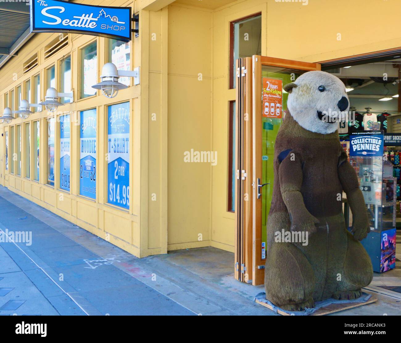 The Seattle Shop Pier clothing and souvenir store with a life size toy ...