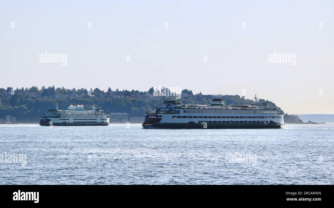 Walla Walla ferry passing the Suquamish ferry of Washington State ...