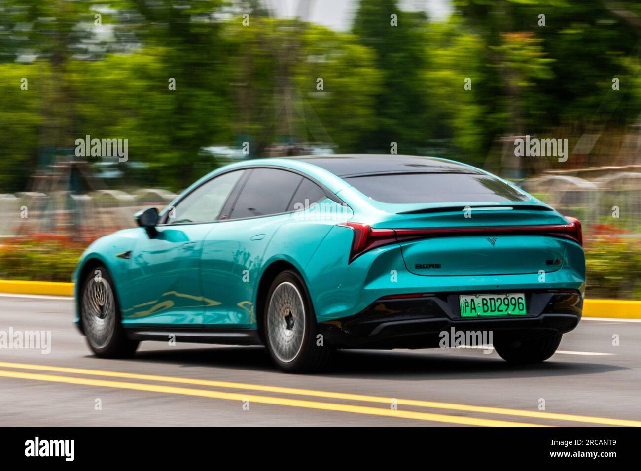 An electric Neta S sedan, from a Chinese EV startup, driving by in ...